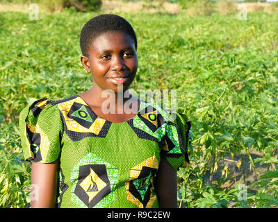 Portrait of pretty Congolese girl with Congo hairstyle in town of Pweto ...