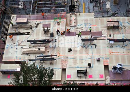 Aerial view of men and materials during the construction of a 42-story ...