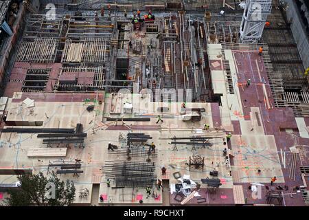 Aerial view of men and materials during the construction of a 42-story ...