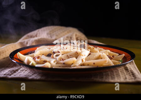 Russian 'Makarony po-flotski' (navy-style pasta) made of cooked pasta ...