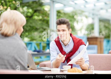 Explaining points of contract Stock Photo - Alamy