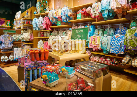 Children shopping for clothes in the Disney Store, the Village ...