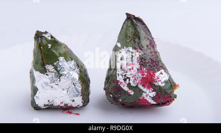 Paan is a preparation combining betel leaf with areca nut widely ...