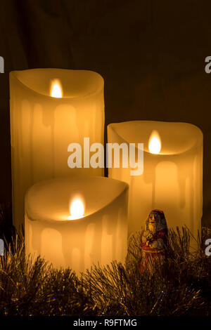 Father Christmas with lit candles Stock Photo - Alamy