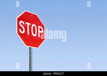 Red Stop Sign with Blue Sky and Clouds Background Stock Photo - Alamy
