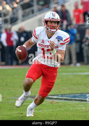 HOUSTON, TX - DECEMBER 13: Houston Cougars guard Milos Uzan (7) shoots ...