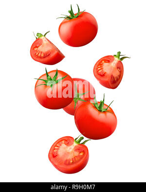 Whole tomato with half and a quarter slice isolated on white background ...