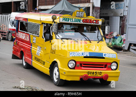 A jeepney, public transport in the Philippines, in Subic Bay, Luzon, in ...