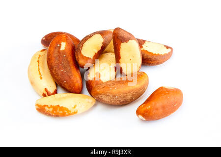 Few Brazil nuts isolated on white background Stock Photo - Alamy