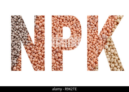 NPK letters made of mineral fertilizers on the white background. N ...