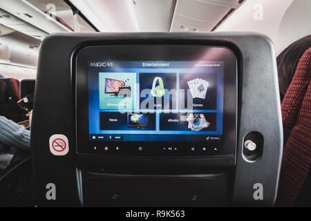 In Flight entertainment screen on an Emirates Plane Stock Photo ...