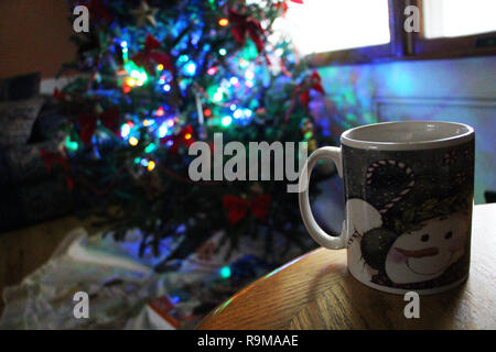 Snowman with cup coffee. Snow man isolated on snow background Stock ...