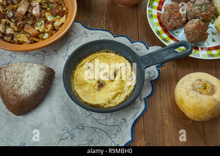 Flaskpannkaka, oven-made pancake baked from eggs, milk, of sliced pork ...