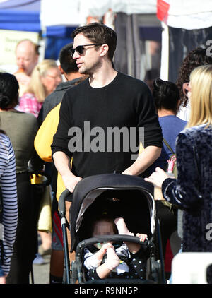 Topher Grace goes to the farmers market with his wife Ashley and ...