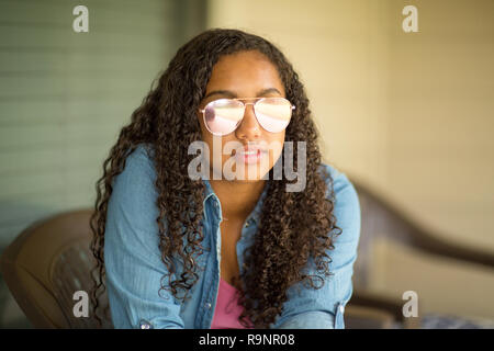 Girl in deep thought Stock Photo - Alamy