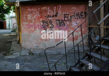 Poverty. Suburbs. Inner courtyard of a house with laundry clothes ...