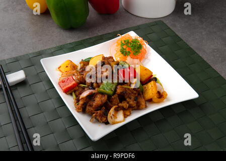 stir-fried chinese style grouper fish fillet with herbs and black ...