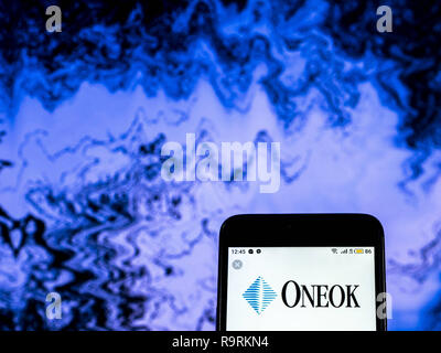 Oneok Natural gas liquids company logo seen displayed on smart phone ...