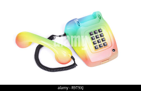 Vintage rainbow colored telephone with a white background Stock Photo ...