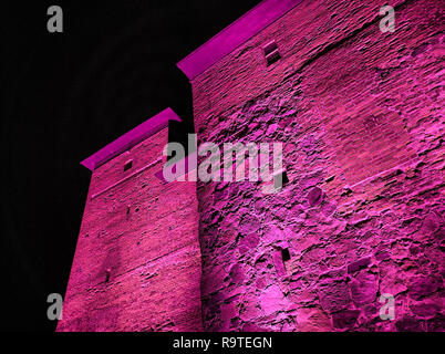 Medieval castle exterior night scene during light festival. Surreal ...