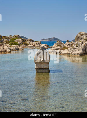 Lycian stone sarcophagus with pointed lid of the roman era popping up ...