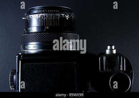 Camera lens on dark background Stock Photo - Alamy