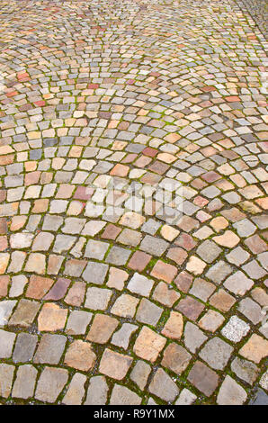 Paths and walkways made from small dressed stone blocks, some centuries ...