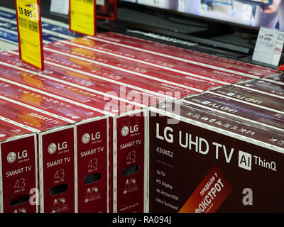 Boxes with LG television in the store Stock Photo - Alamy
