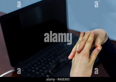 Girl crossing the hands while taking the rest in the office Stock Photo ...