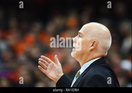 St. Bonaventure head coach Mark Schmidt draws up a play during a time ...