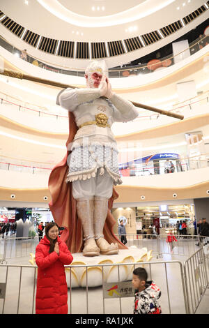 Xi'an, China. 30th Dec, 2018. The Monkey King sculpture can be seen at ...