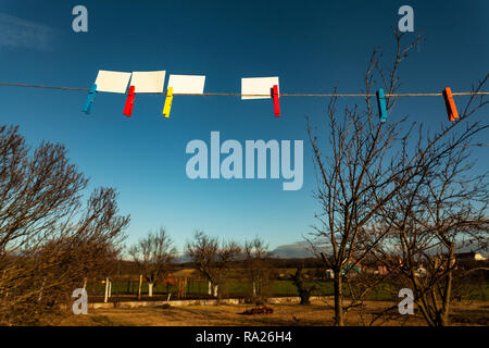 Business cards pegged to a washing line (can add text Stock Photo - Alamy