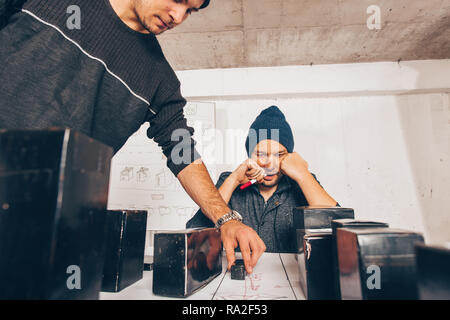 Stealers are looking in maps and making a plan for robbery Stock Photo ...