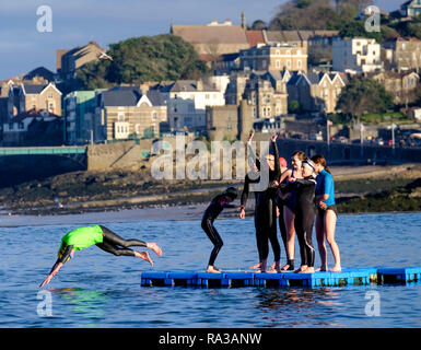 Clevedon, Somerset, UK. 1st Jan 2019. A bracing dip in the Marine Lake ...