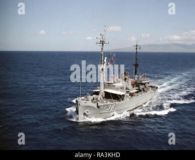 A port bow view of the salvage ship USS BOLSTER (ARS-38) underway ...