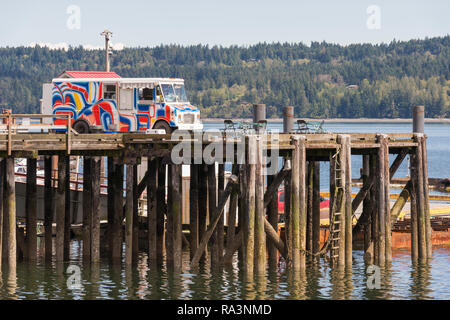 A colourful van selling fast food at a dock on Vancouver Island Stock ...