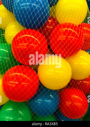 Plastic colored balls in grid. Studio Photo Stock Photo - Alamy