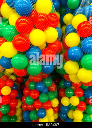 Plastic colored balls in grid. Studio Photo Stock Photo - Alamy