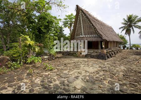 Traditional house, with stone money, Yap, Caroline Islands, Micronesia ...