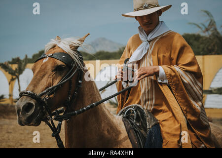 TRUJILLO, PERU - SEPTEMBER 2018 : Peruvian Morochuco cowboy on horse ...