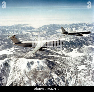 Aerial view of a Plane being refueled and luggage loaded at airport ...