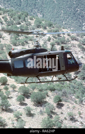 An Army UH-1 Iroquois helicopter takes off to transport "casualties" to ...