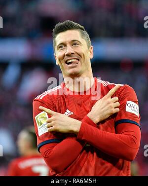 Typical goal celebration with crossed arms and outstretched tongue ...