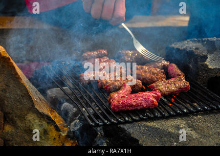 Bbq cevapi rostilj beef Bosnian food cooking on the grill Stock Photo ...