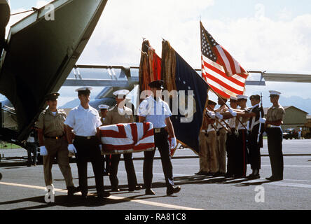 Joint-service pallbearers transfer flag-draped coffins of missing in ...