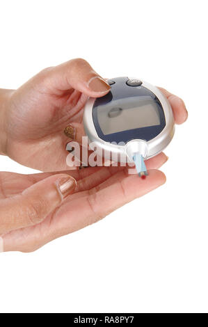 Female hands and glucometer measuring blood sugar close up Stock Photo ...