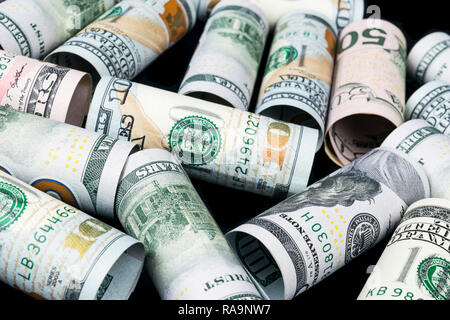 Dollar. Dollar banknotes roll in other positions. American US currency ...