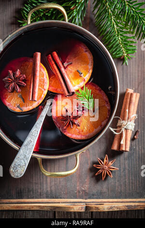 Aromatic and tasty mulled red wine with cloves and anise Stock Photo ...