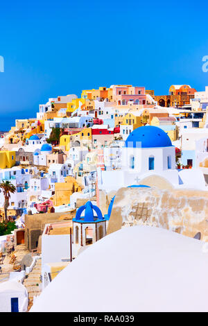 A vertical shot of white houses in Santorini, Greece Stock Photo - Alamy
