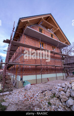 An almost complete new build house with wood fascia Stock Photo - Alamy